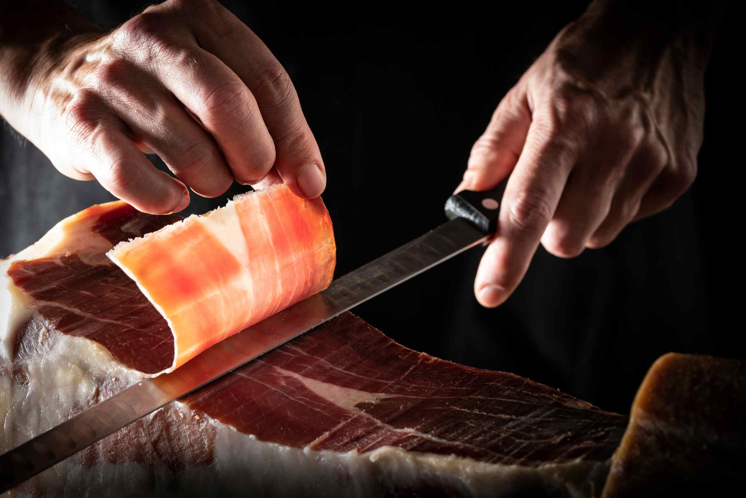 ¡Aprende el arte de cortar un jamón para disfrutarlo lentamente como un ...